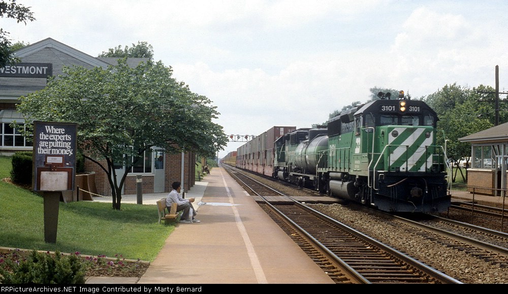 BN 3101 With Fuel Tanker, Sister, and Stacks At the Then New Station